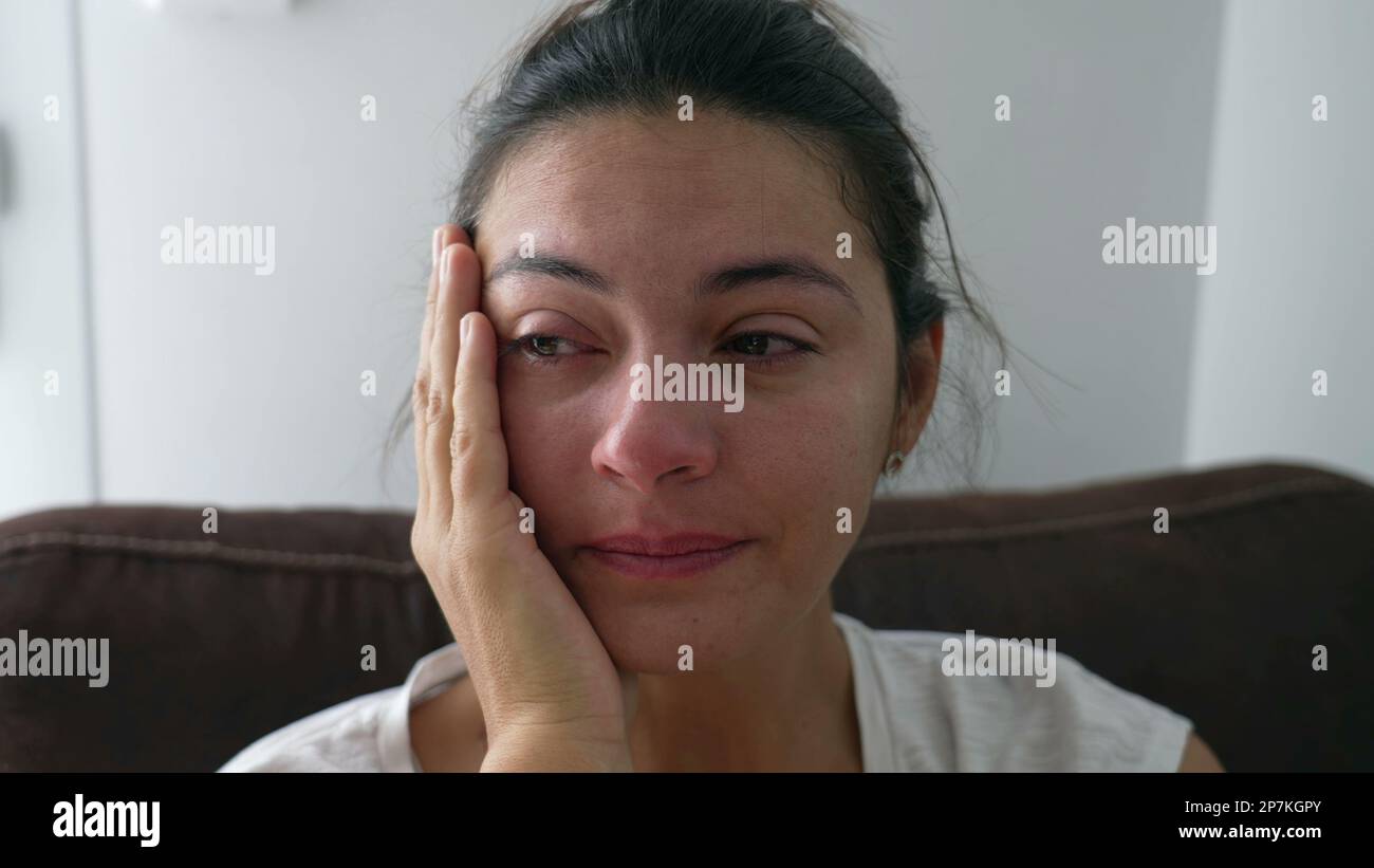 Sad woman taking a deep breath feeling anxious. Crying female person ...