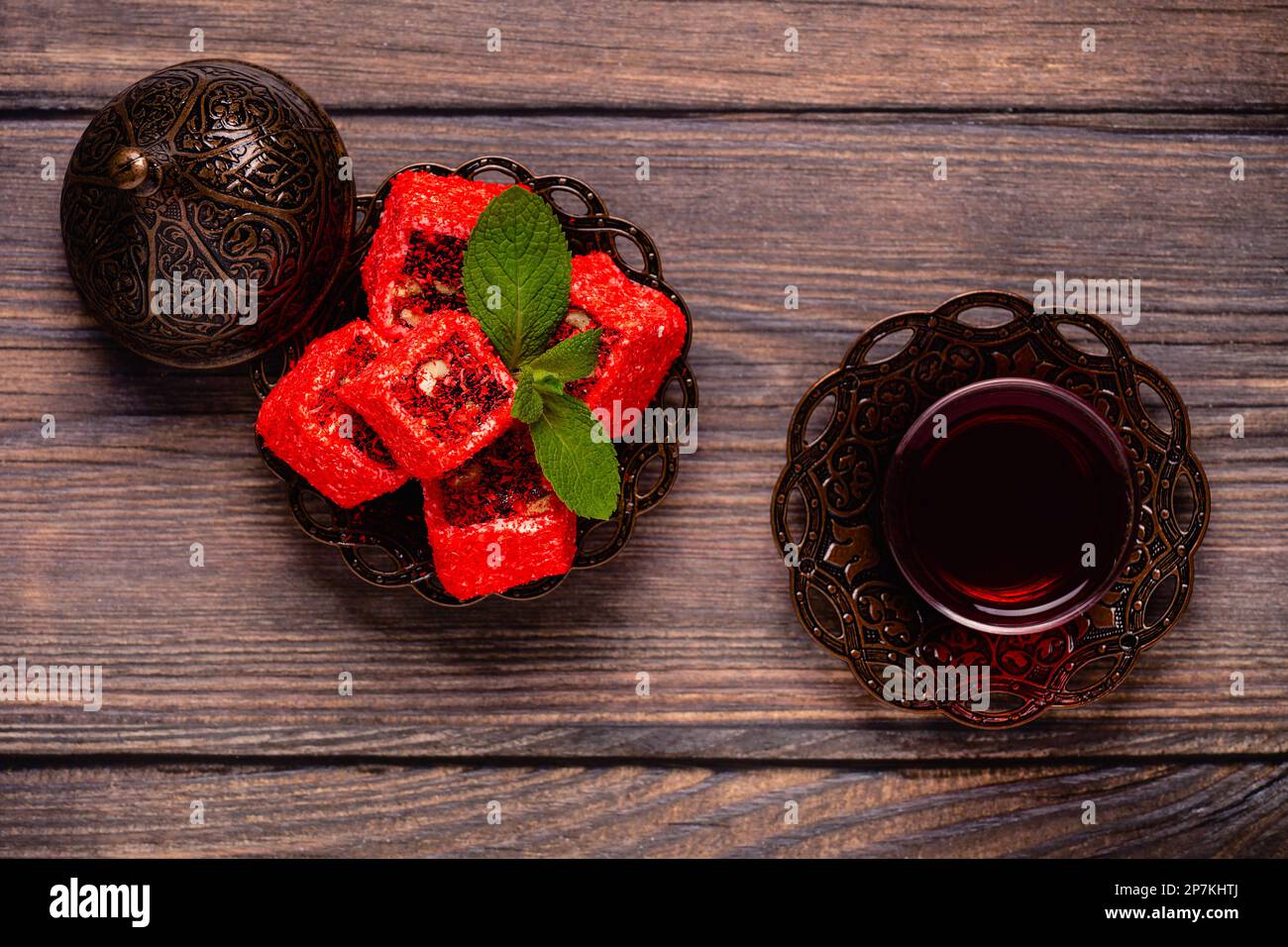 Traditional Turkish Delight with glass of tea, top view Stock Photo - Alamy