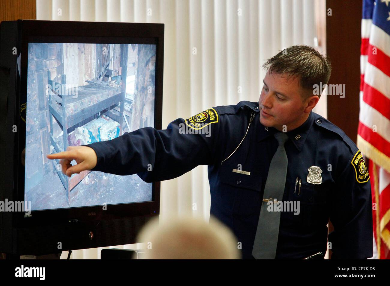 In this Jan. 26 2010 photo, Michigan State trooper Trever Slater ...