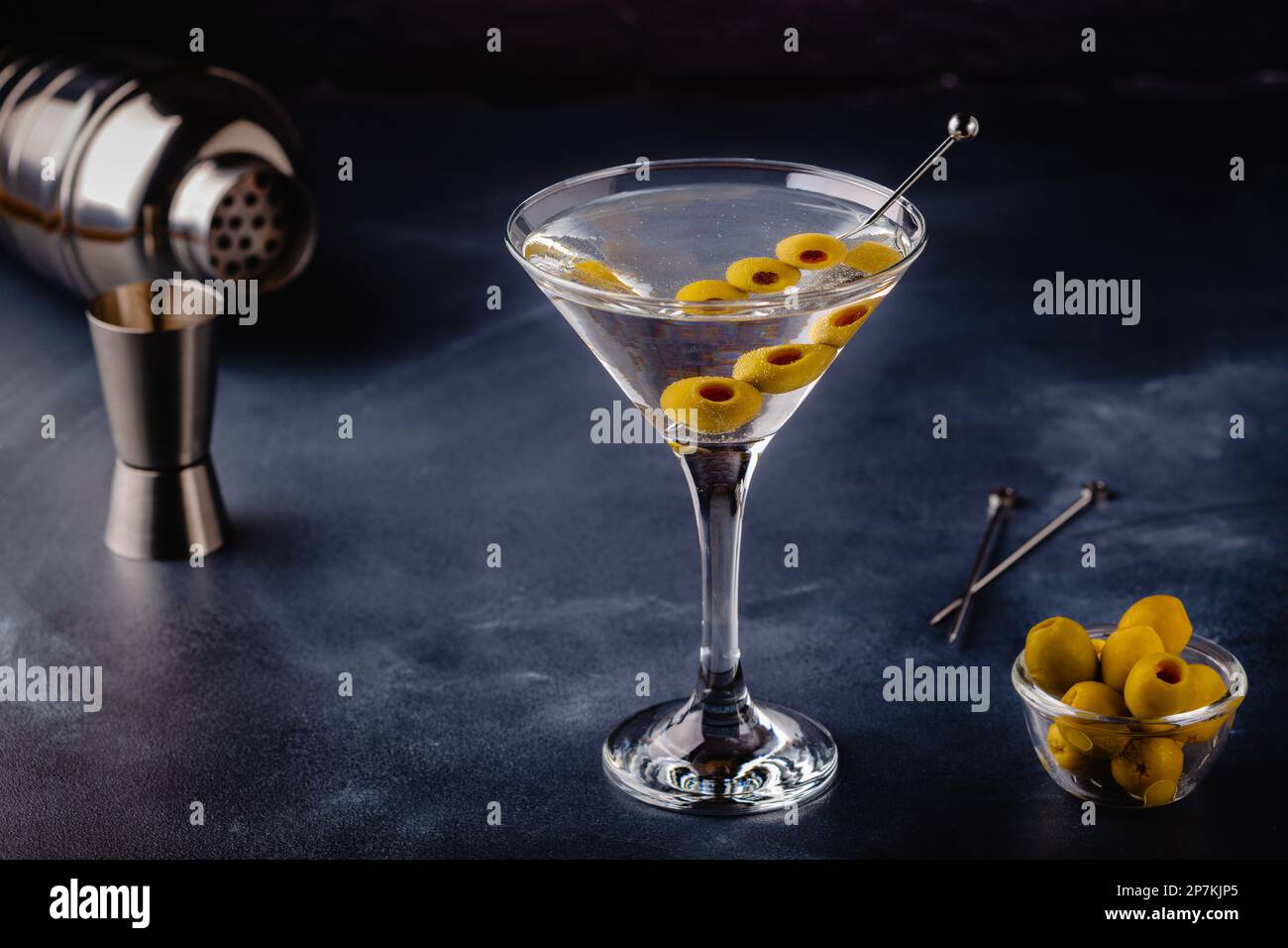 Classic Dry Martini with olives on dark stone table Stock Photo - Alamy