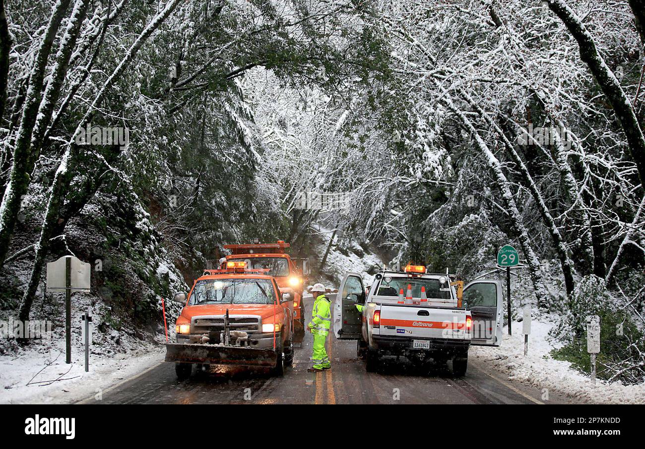 CalTrans personnel prepare to open up Highway 29 on Mount St. Helena ...