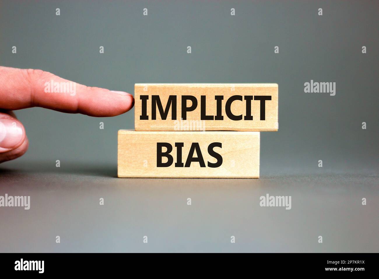 Implicit bias symbol. Concept words Implicit bias on wooden block ...