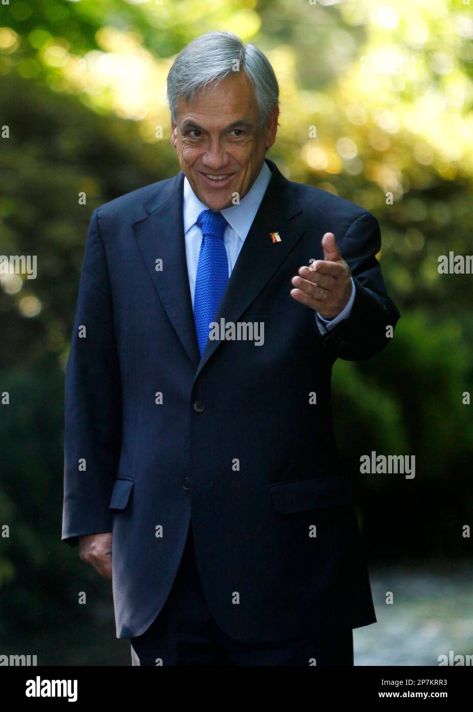 President-elect Sebastian Pinera, gestures at his home in Santiago ...