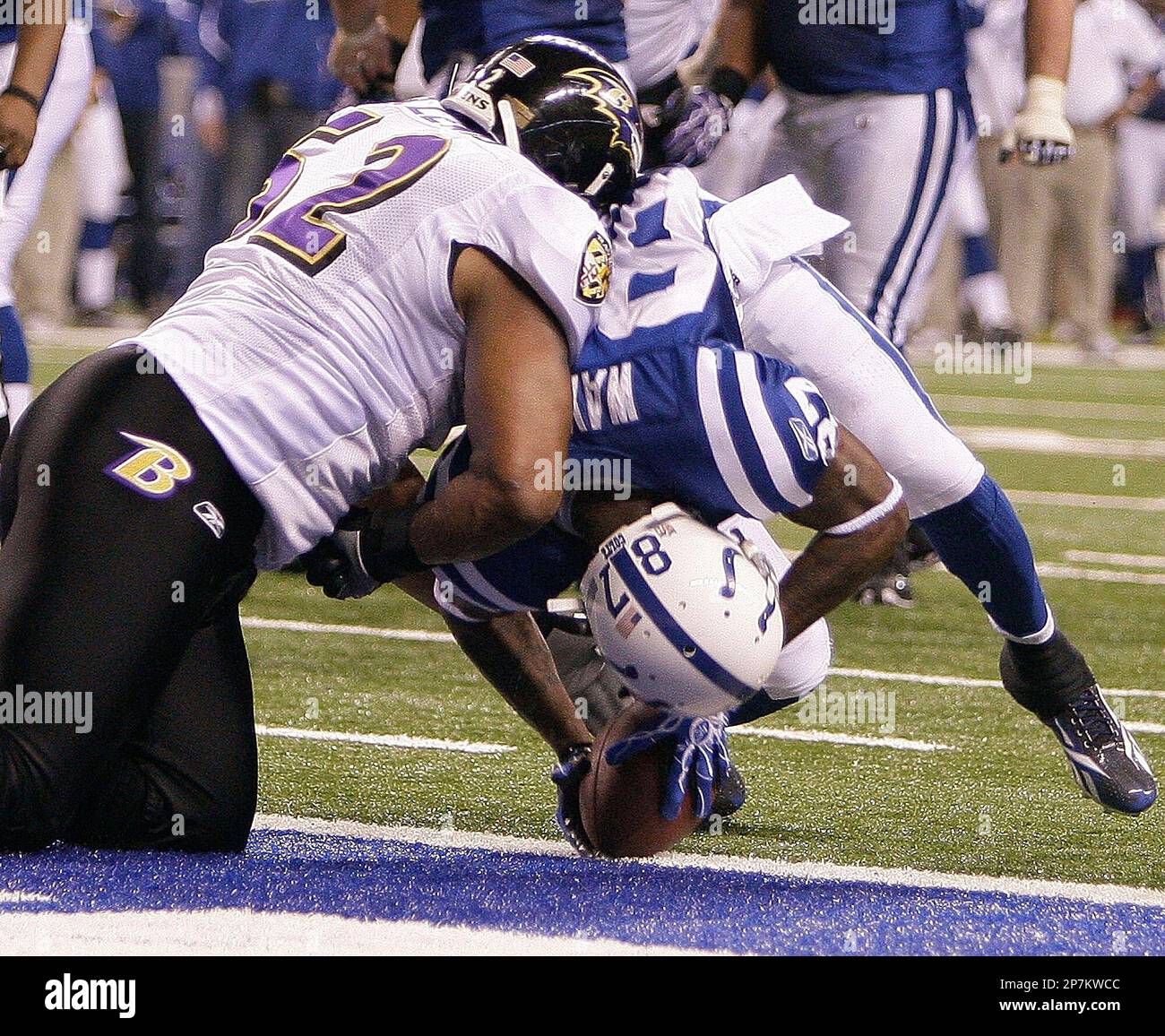 Indianapolis Colts wide receiver Reggie Wayne is stopped just short of ...