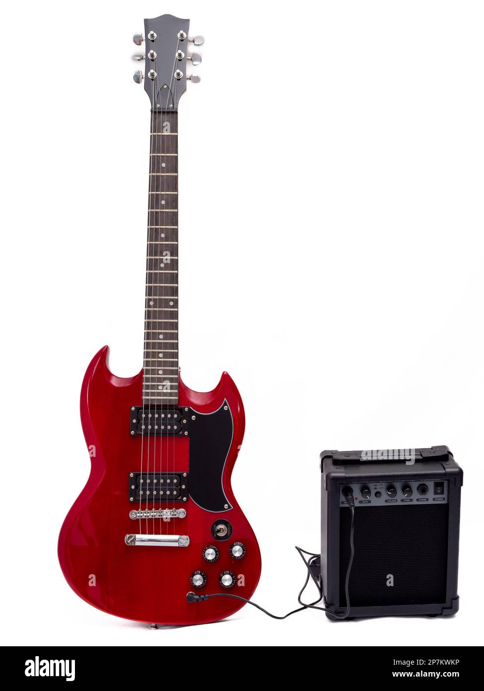 Red electric guitar and classic amplifier. Musical instrument guitar ...