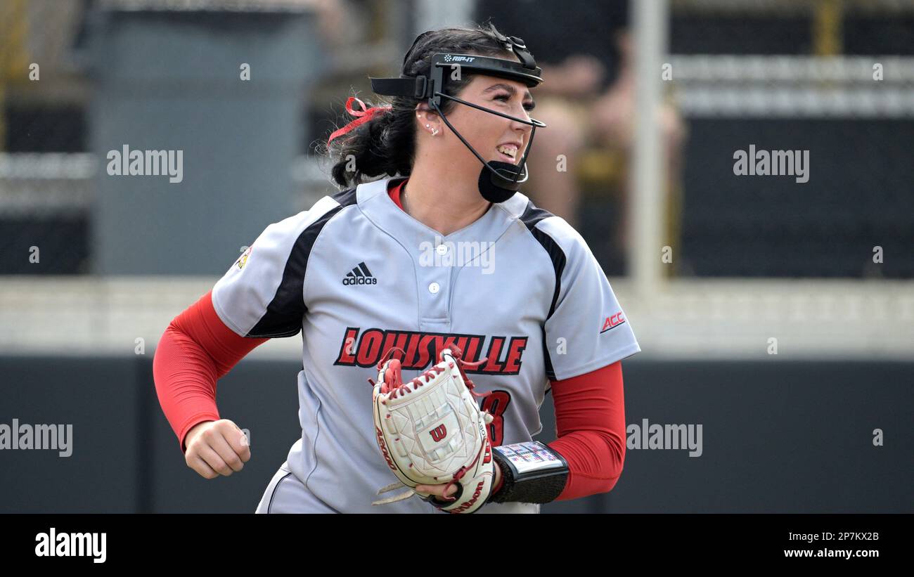 Louisville pitcher Taylor Roby (8) reacts after catching a popped-up ...