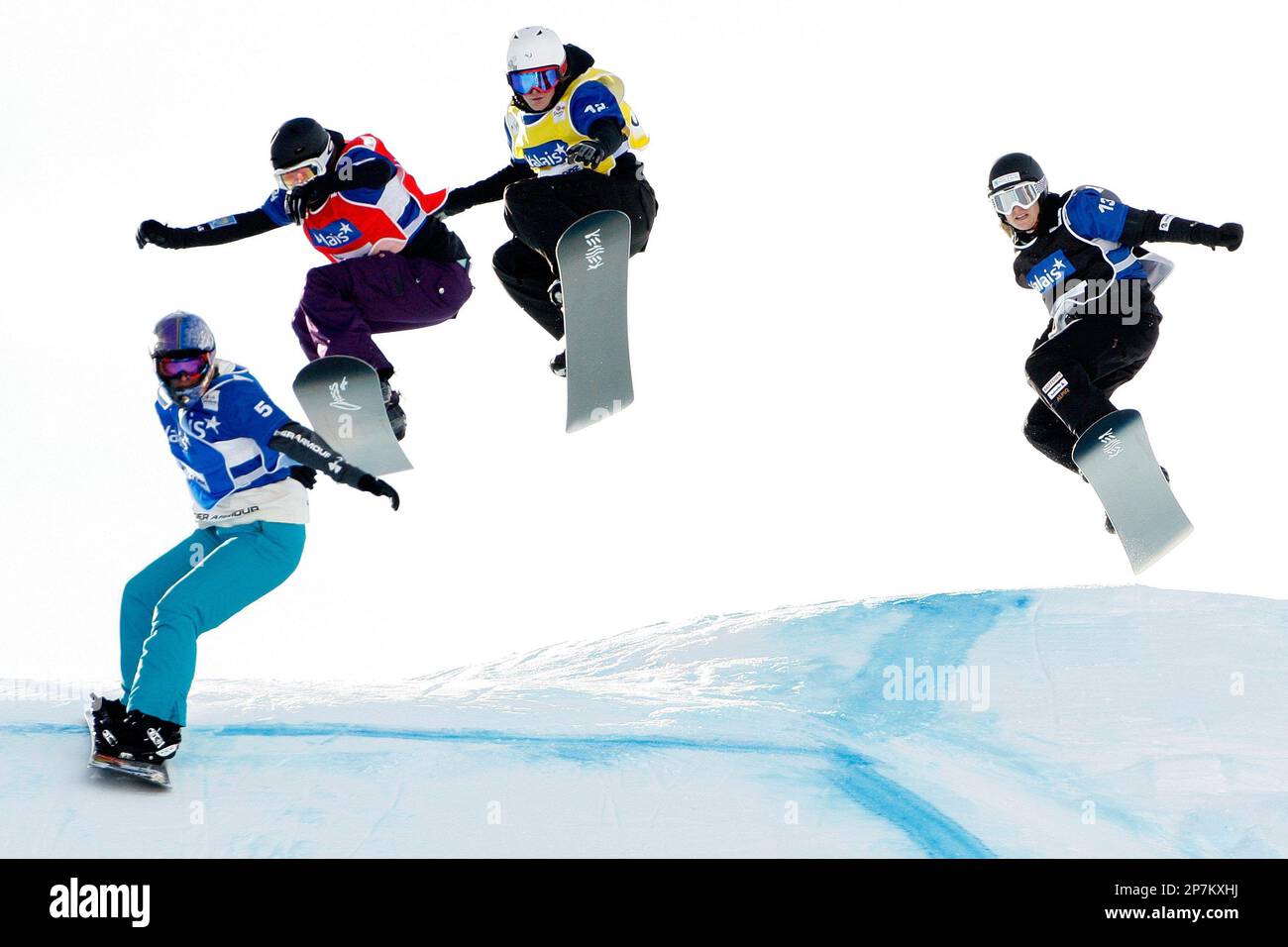 Lindsey Jacobellis of the US, left, Maelle Ricker of Canada, 2nd left ...
