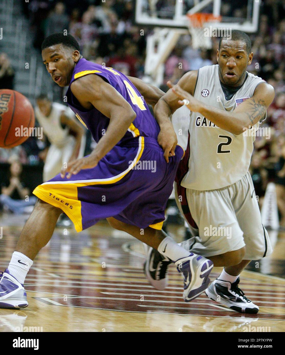 South Carolina's Devan Downey makes a steal against LSU's Chris Bass, left, in the second half ...