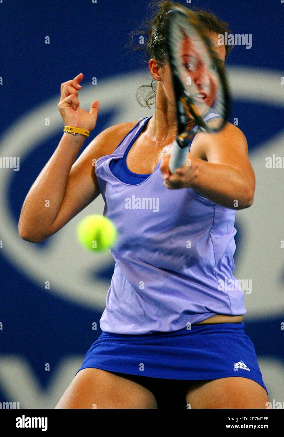 Great Britian's Laura Robson receives a shot against Spain's Maria Jose ...