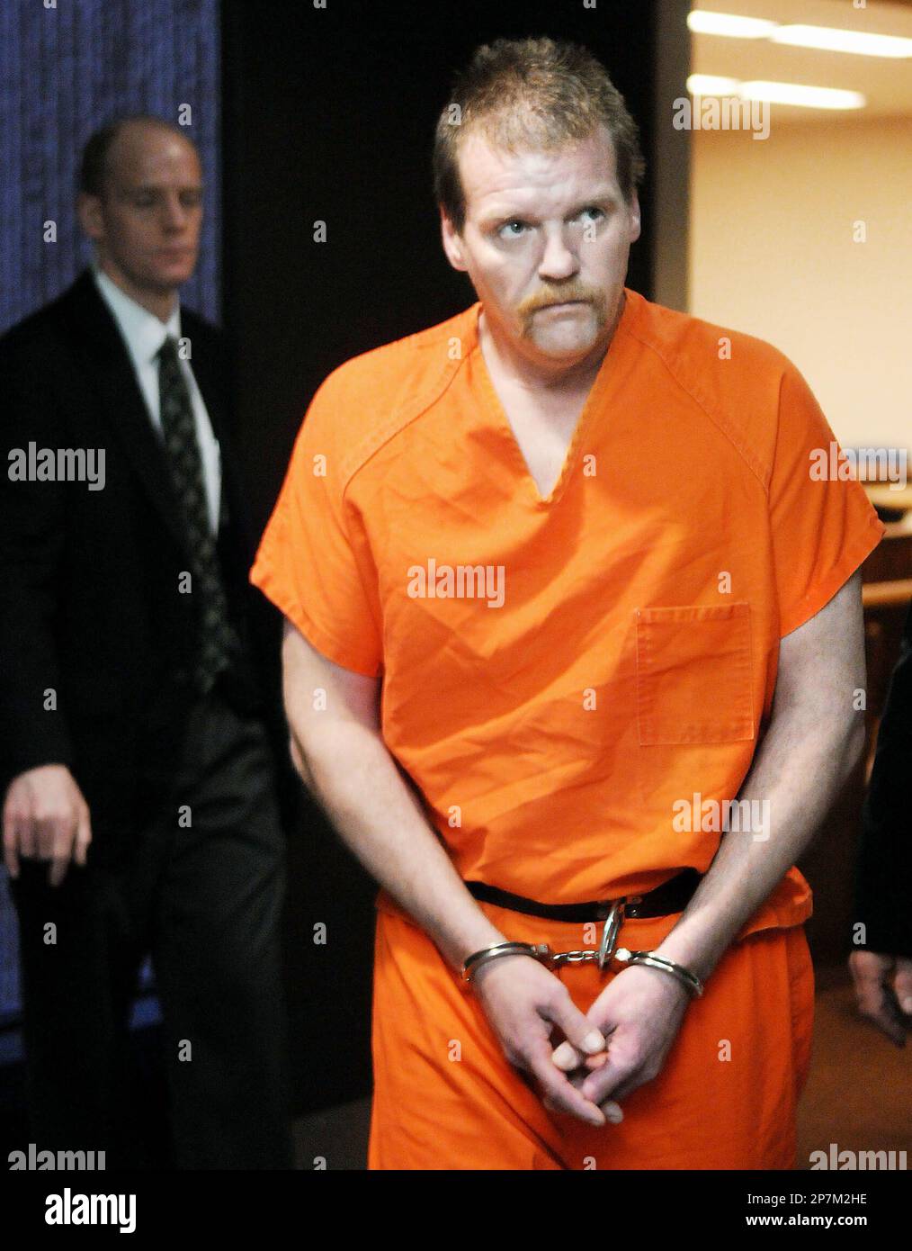 Gregory Gubernot is escorted out of Eau Claire County court on Friday ...