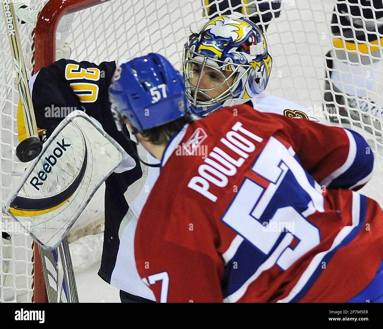 Buffalo Sabres' goaltender Ryan Miller, (30), makes a save on Montreal ...