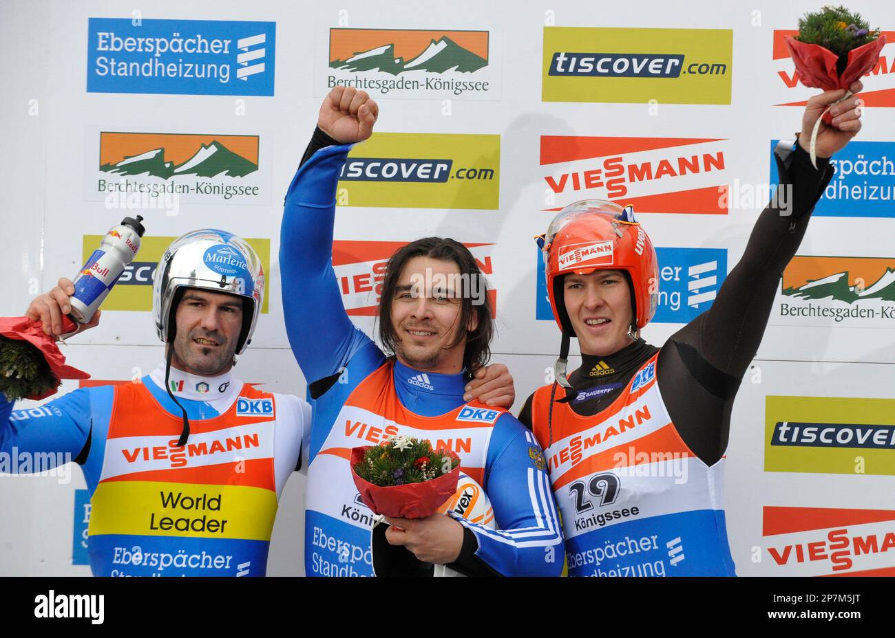 Second placed Armin Zoeggeler from Italy, winner Albert Demtschenko ...