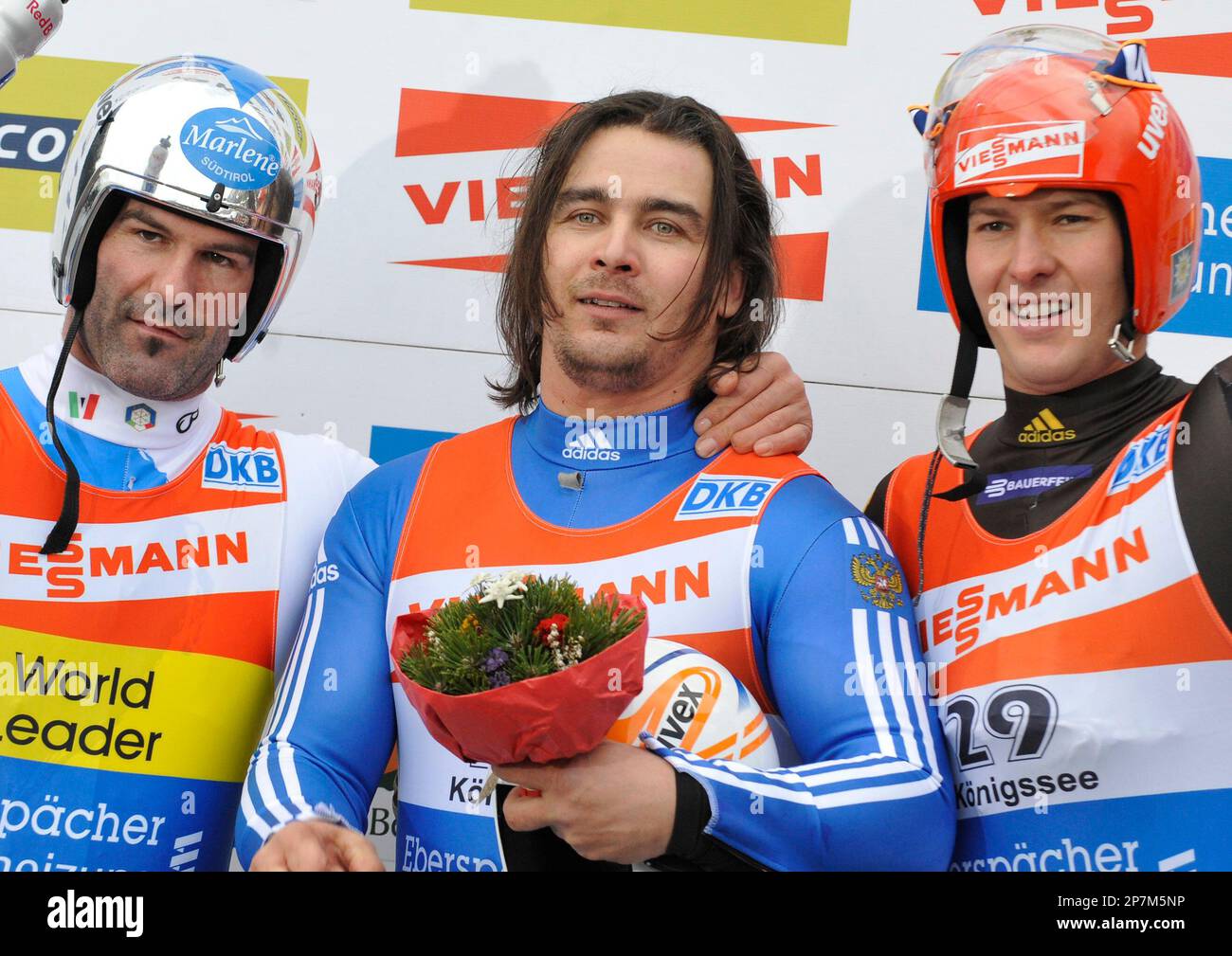 Second placed Armin Zoeggeler from Italy, winner Albert Demtschenko ...