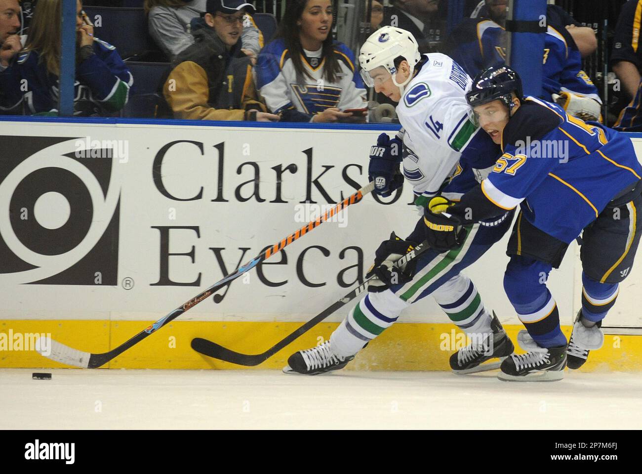 St. Louis Blues' David Perron (57) and Vancouver Canucks' Alexandre ...