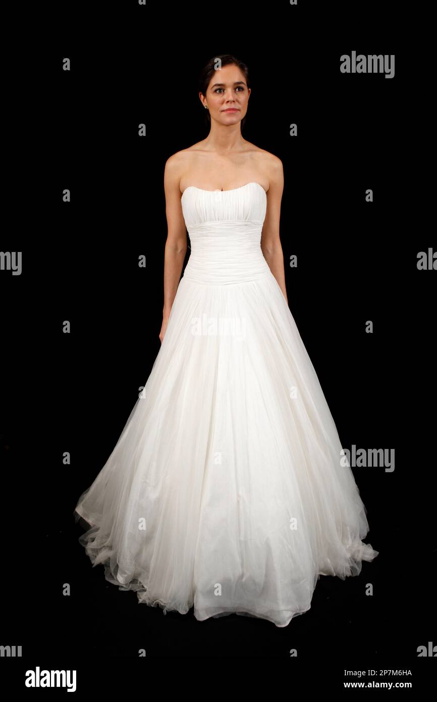 This photo taken Oct. 19, 2009 shows a model wearing a bridal dresses ...