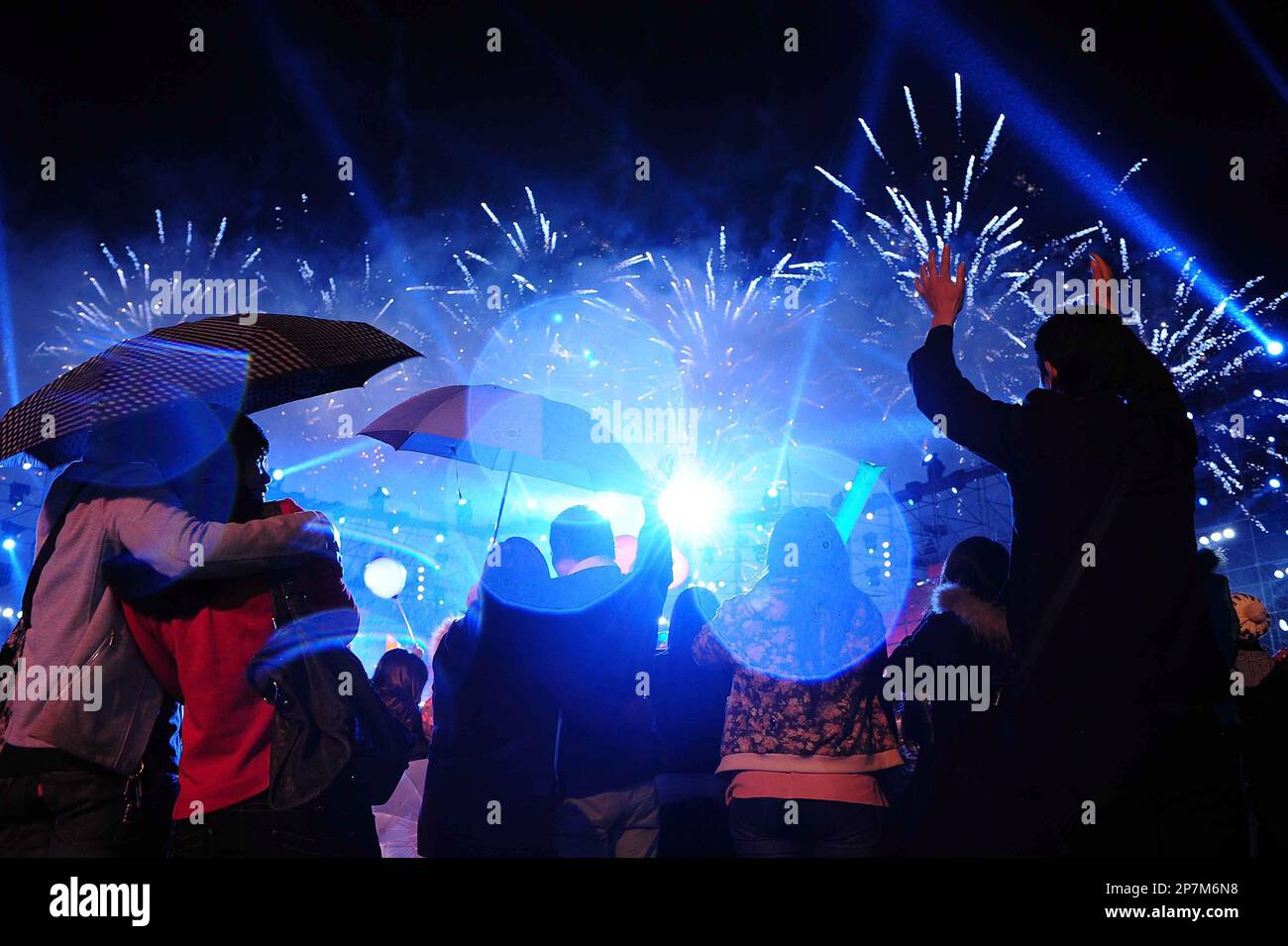 Chinese people watch the fireworks show to welcome the new year at the ...
