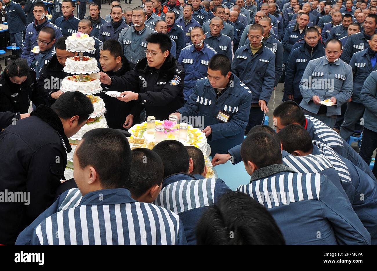 Inmates enjoy birthday cakes during a mass birthday party for inmates ...