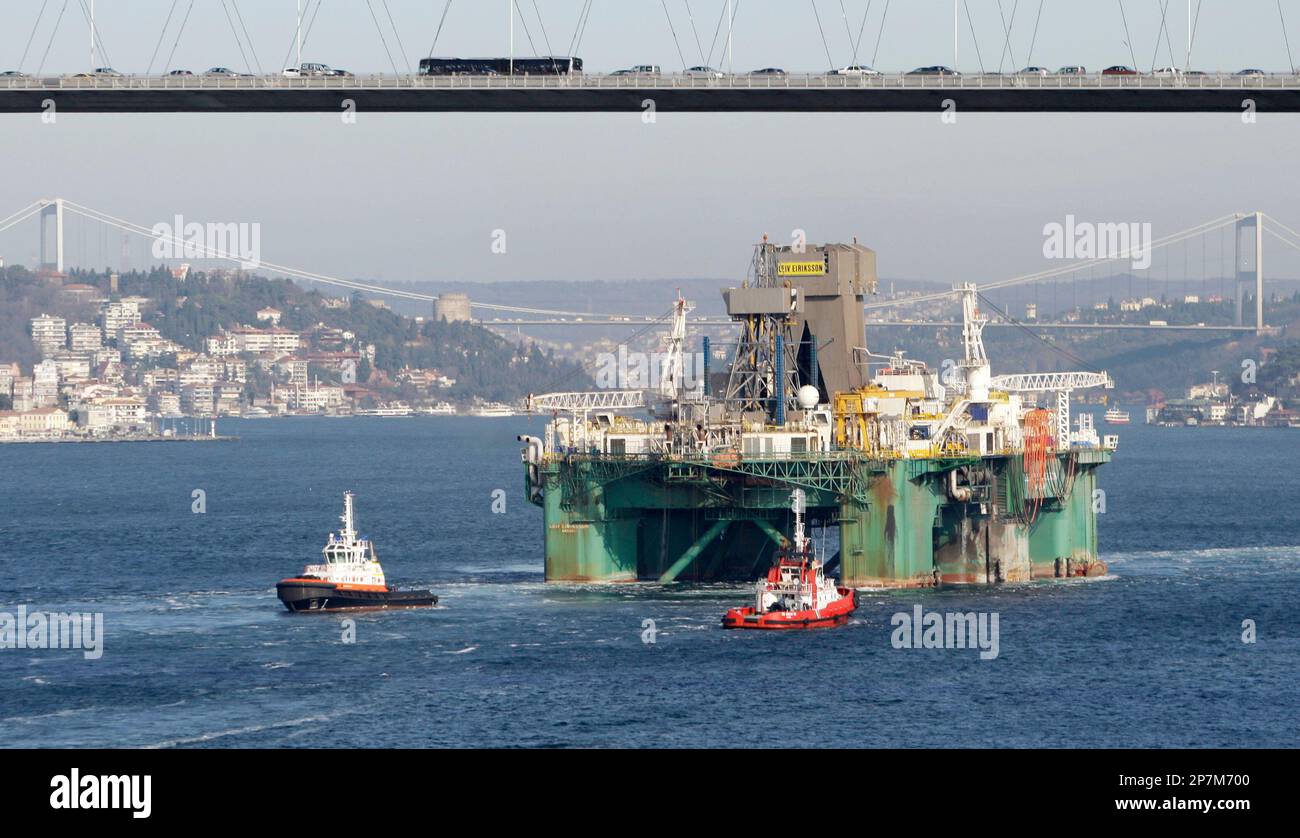 The Leiv Eiriksson, one of the world's largest rigs, passes under the ...