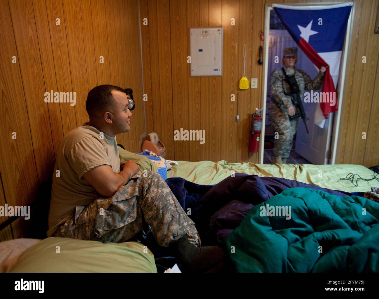 In this Dec. 27, 2009 photo, Sgt. Miguel Perez, 24, waits for his wife ...