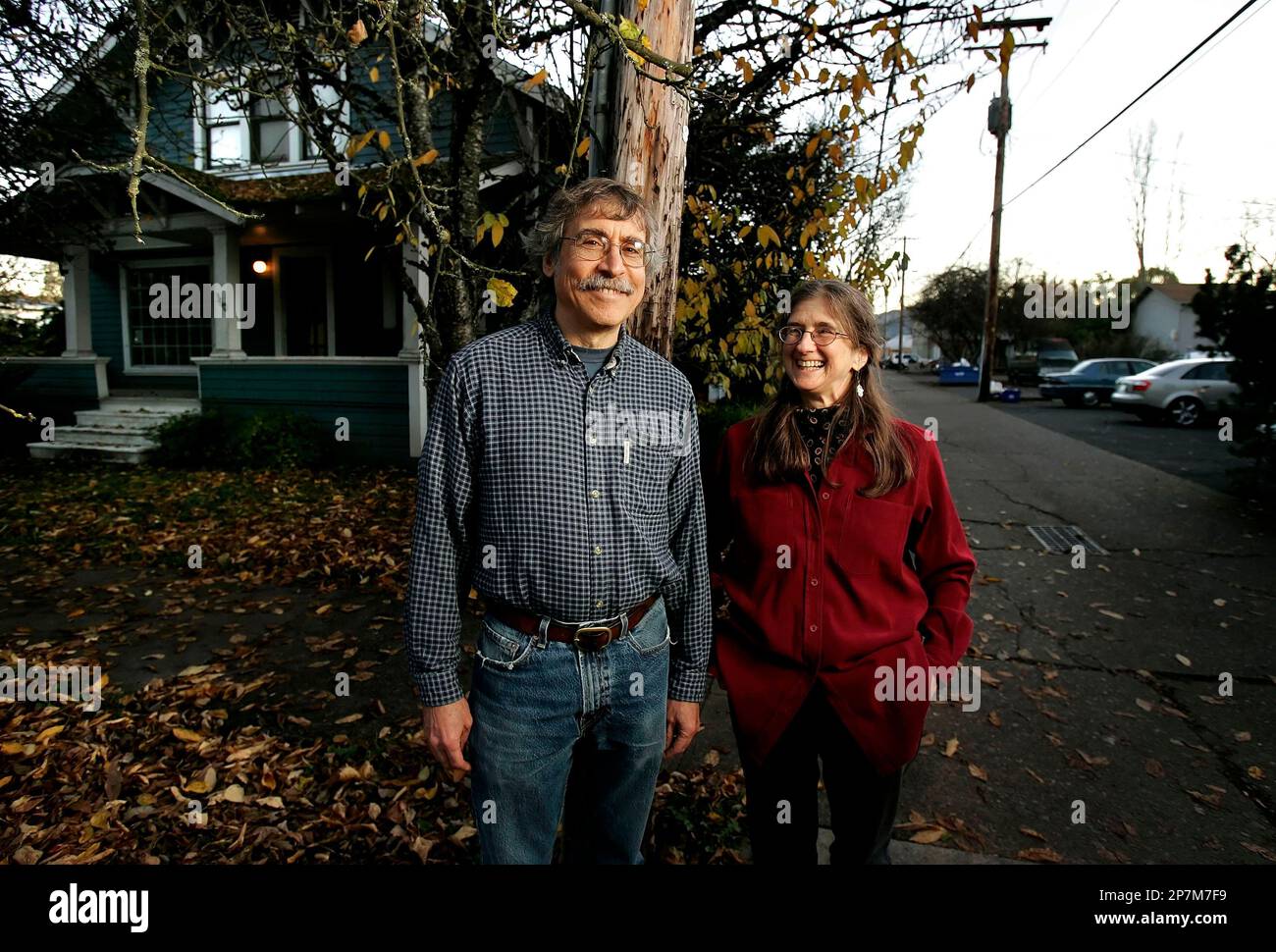 Deborah Healey and her partner, Steve Baker, stand outside their 1920's ...