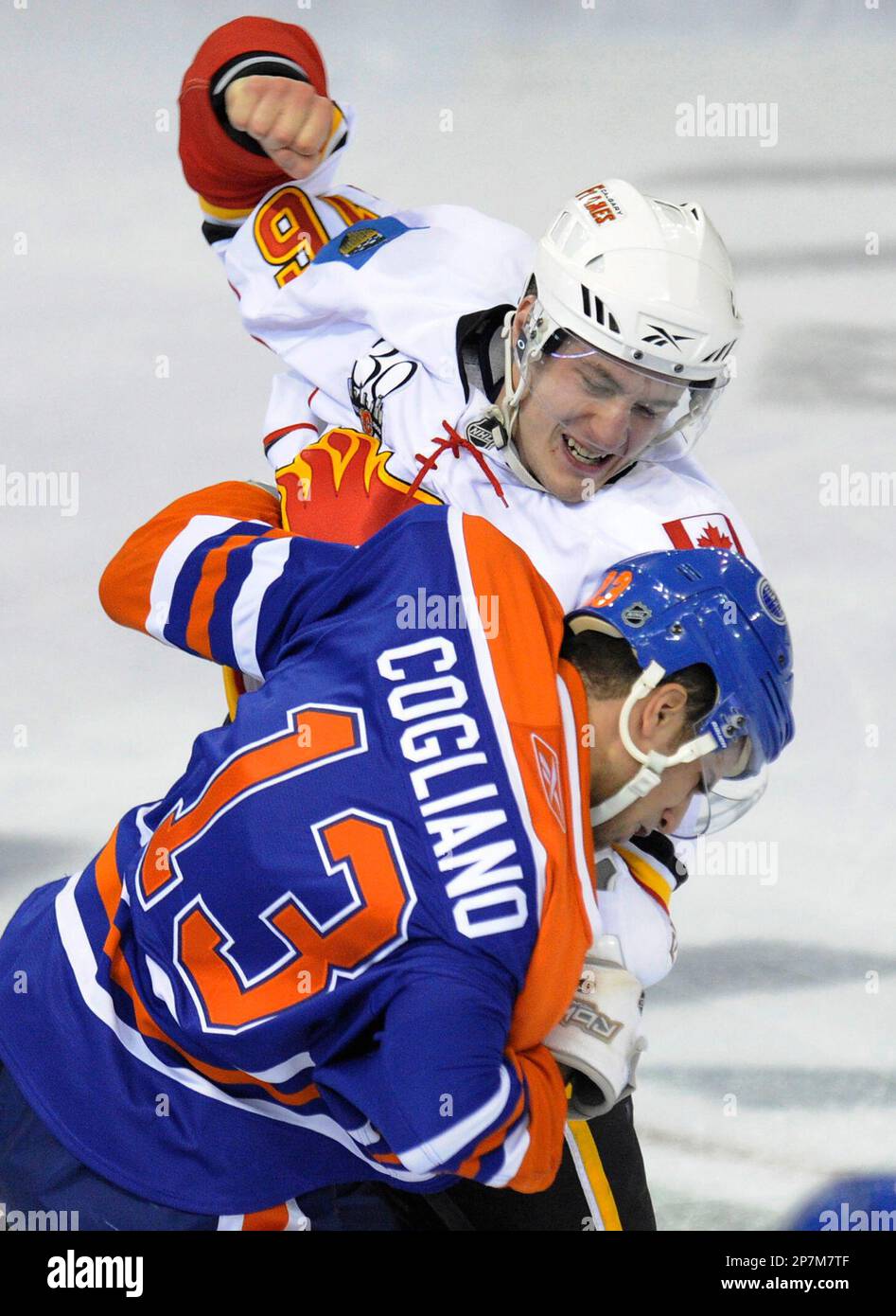 The Edmonton Oilers' Andrew Cogliano, 13, fights with Calgary Flames ...