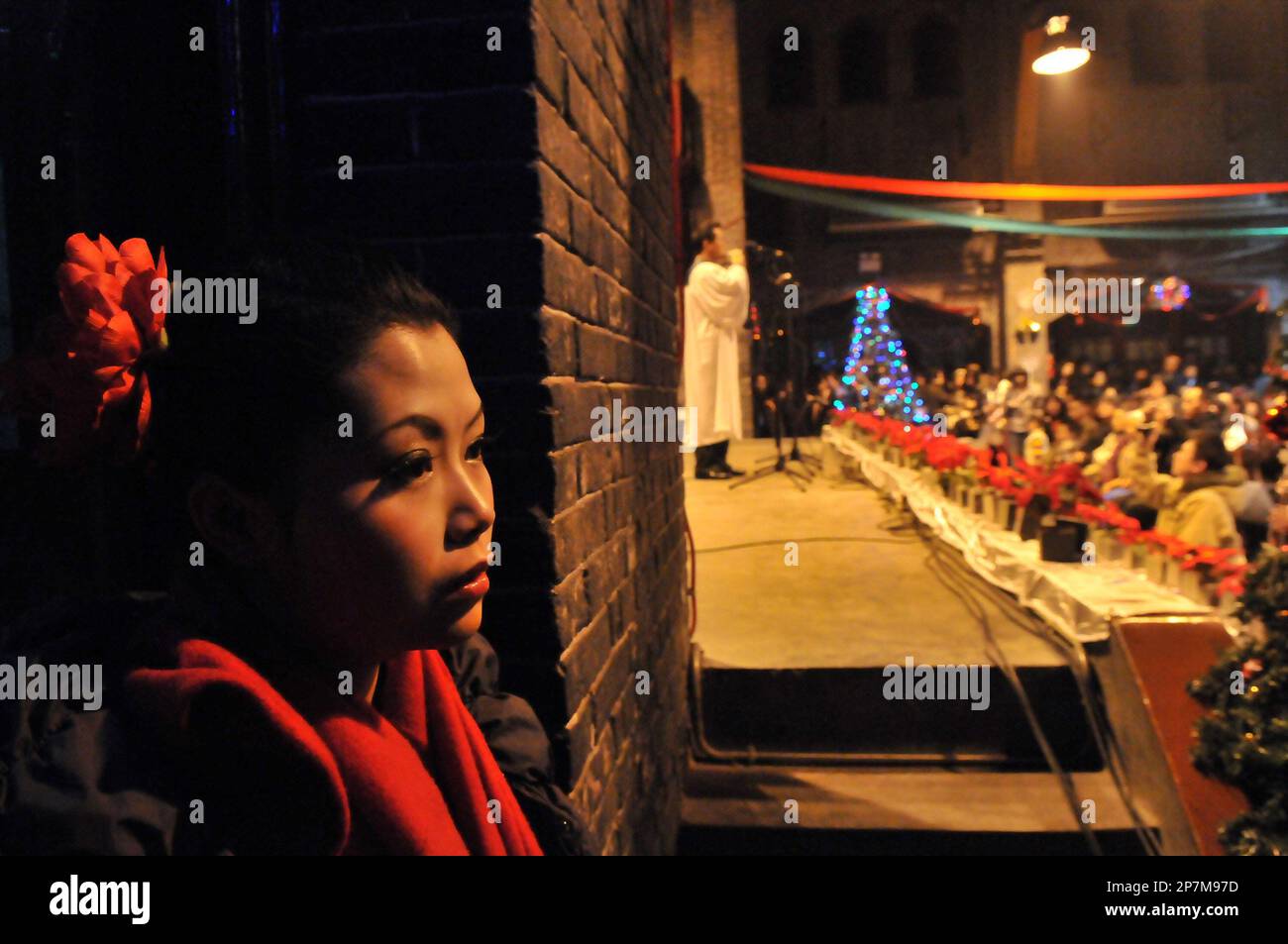 Christians attend a Christmas mass in the Christian Gracious Light ...
