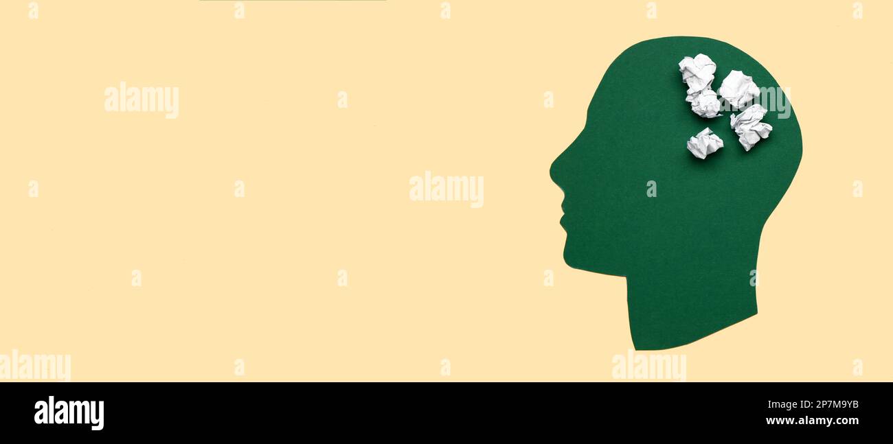 Human head and crumpled paper on beige background with space for text ...