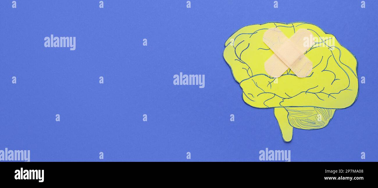 Paper brain and patch on blue background with space for text. Concept ...