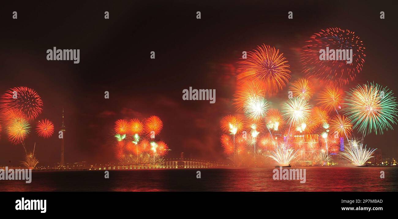 Fireworks explode during a show to celebrate Macau's 10th handover ...
