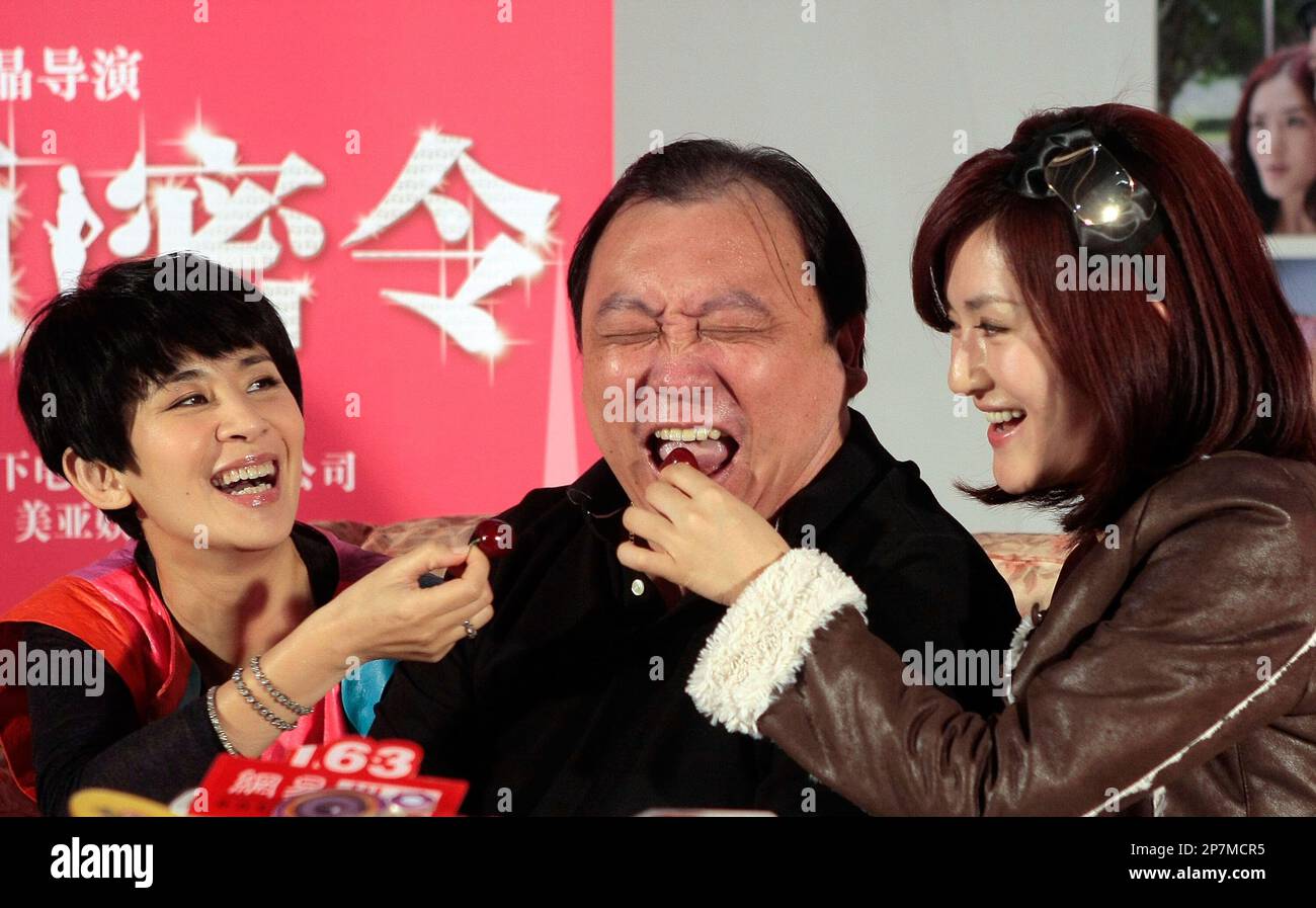 Hong Kong director Jing Wong (C) and actresses Sandra Ng (L) and Xie Na ...