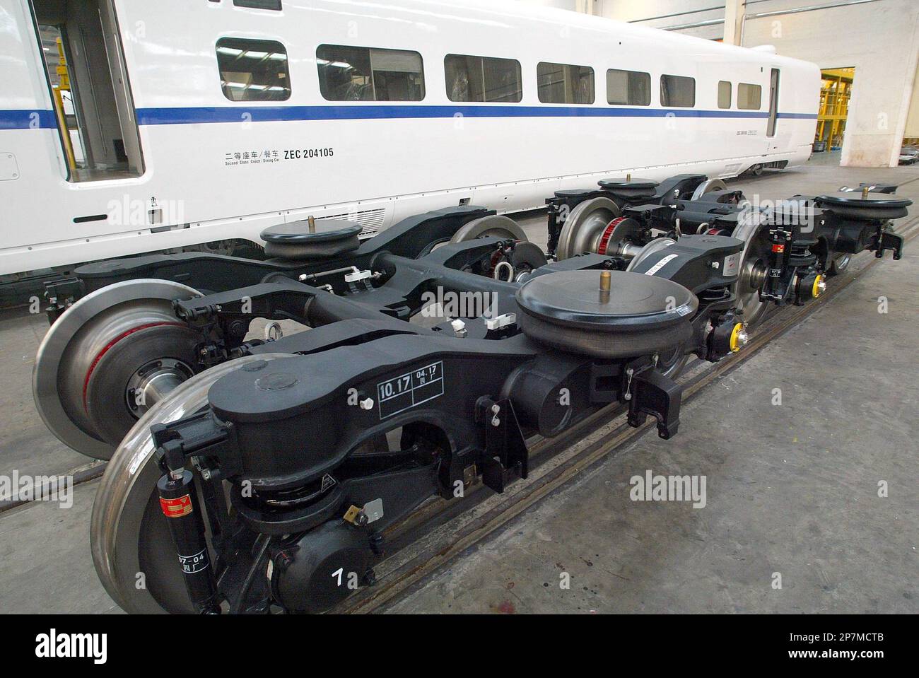 Workers work on the production line of the CRH2 highspeed trains at The ...