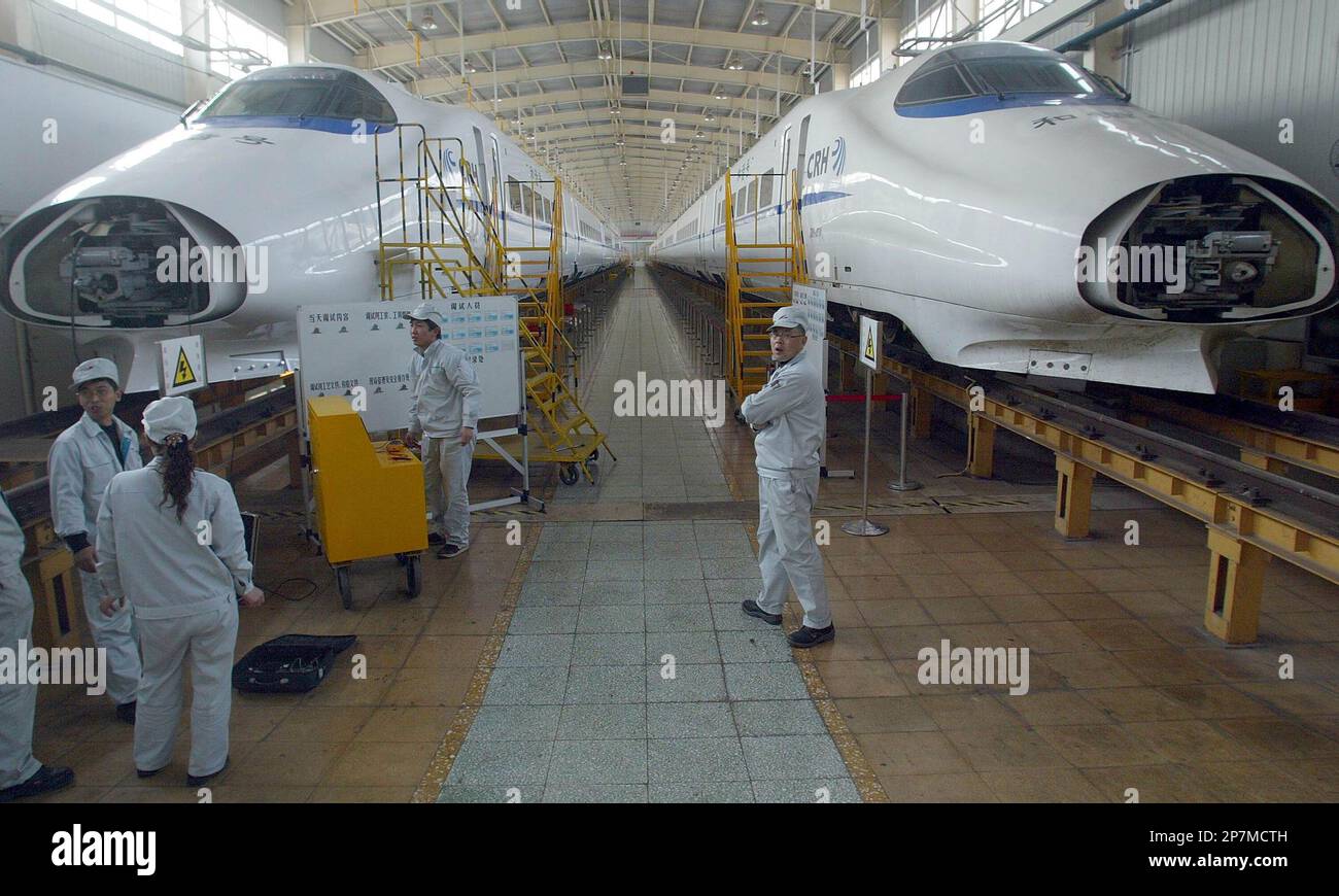 Workers work on the production line of the CRH2 highspeed trains at The ...