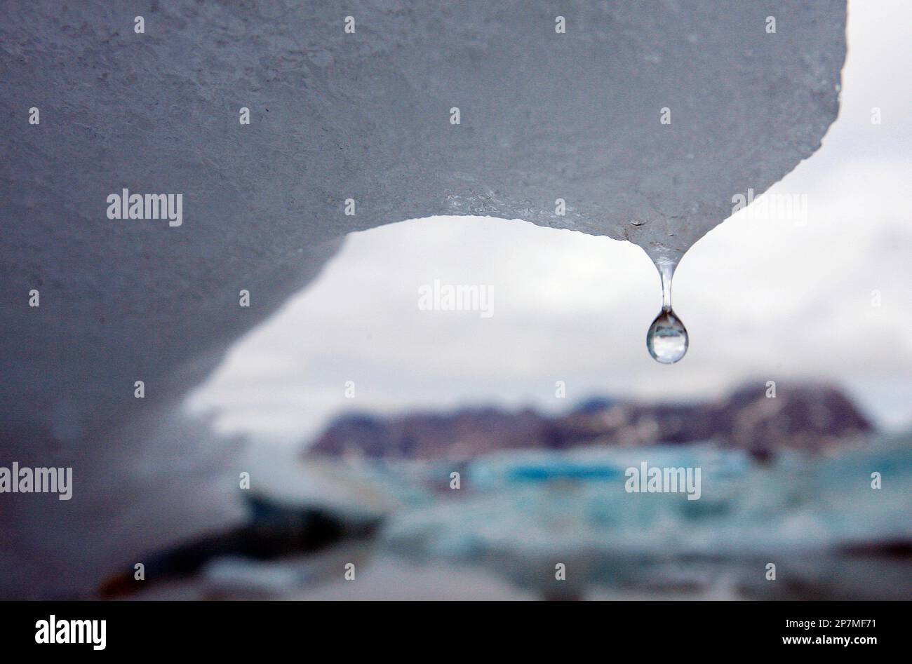 FILE- This July 17, 2007 file photo shows an iceberg melting in Kulusuk ...