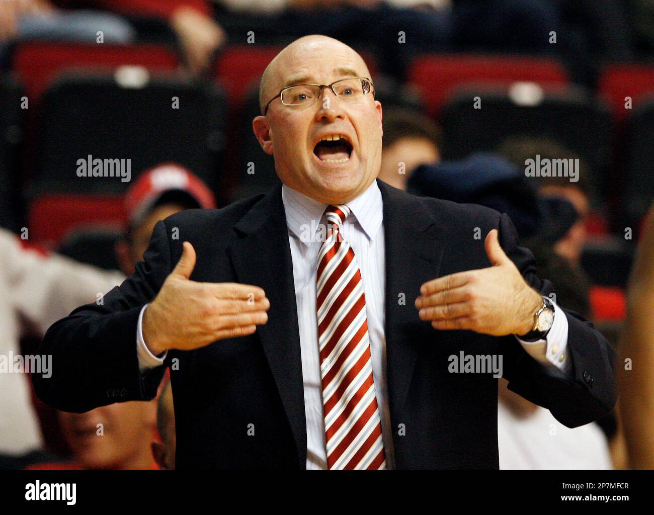 Rutgers head coach Fred Hill shouts to his players during the second ...