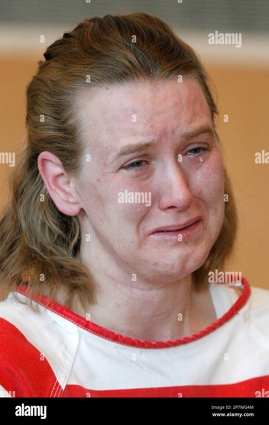 Michelle Kehoe reacts after her husband Eugene Kehoe, not pictured ...