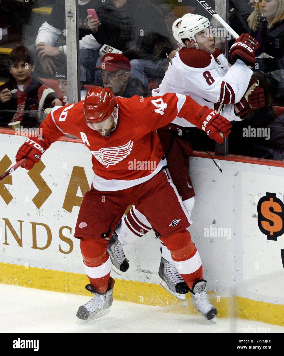 Detroit Red Wings' Henrik Zetterberg (40), of Sweden, checks Phoenix ...