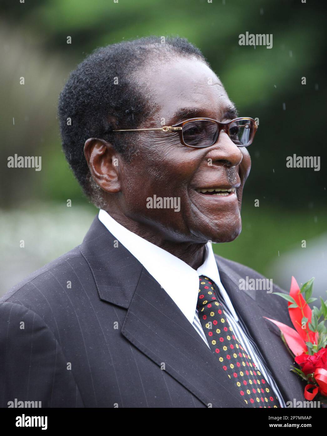 Zimbabwean President Robert Mugabe smiles at the swearing in ceremony ...