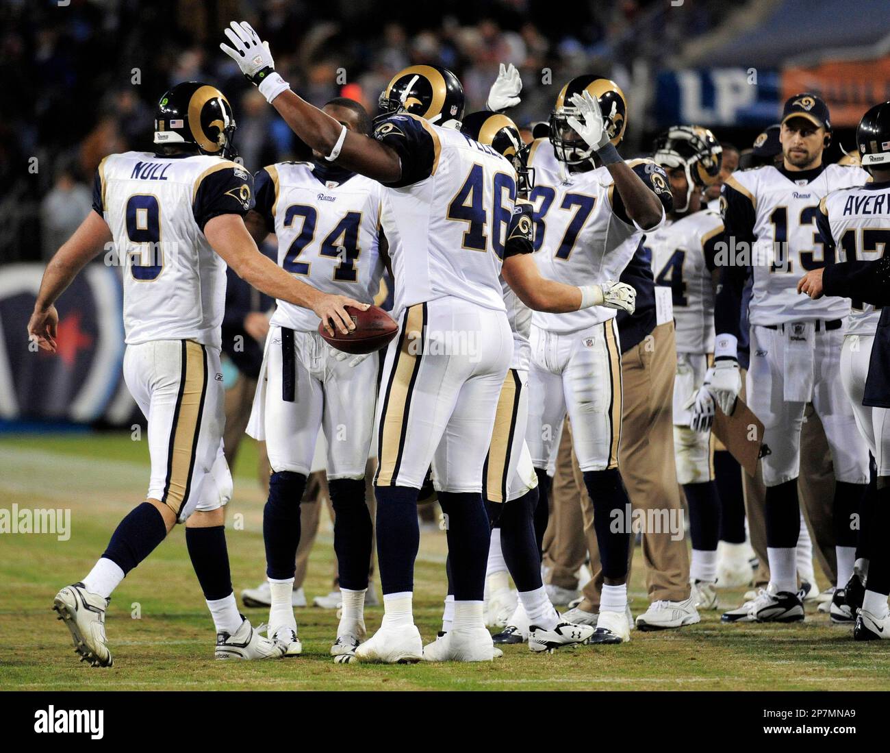 St. Louis Rams quarterback Keith Null (9) is congratulated by teammates ...