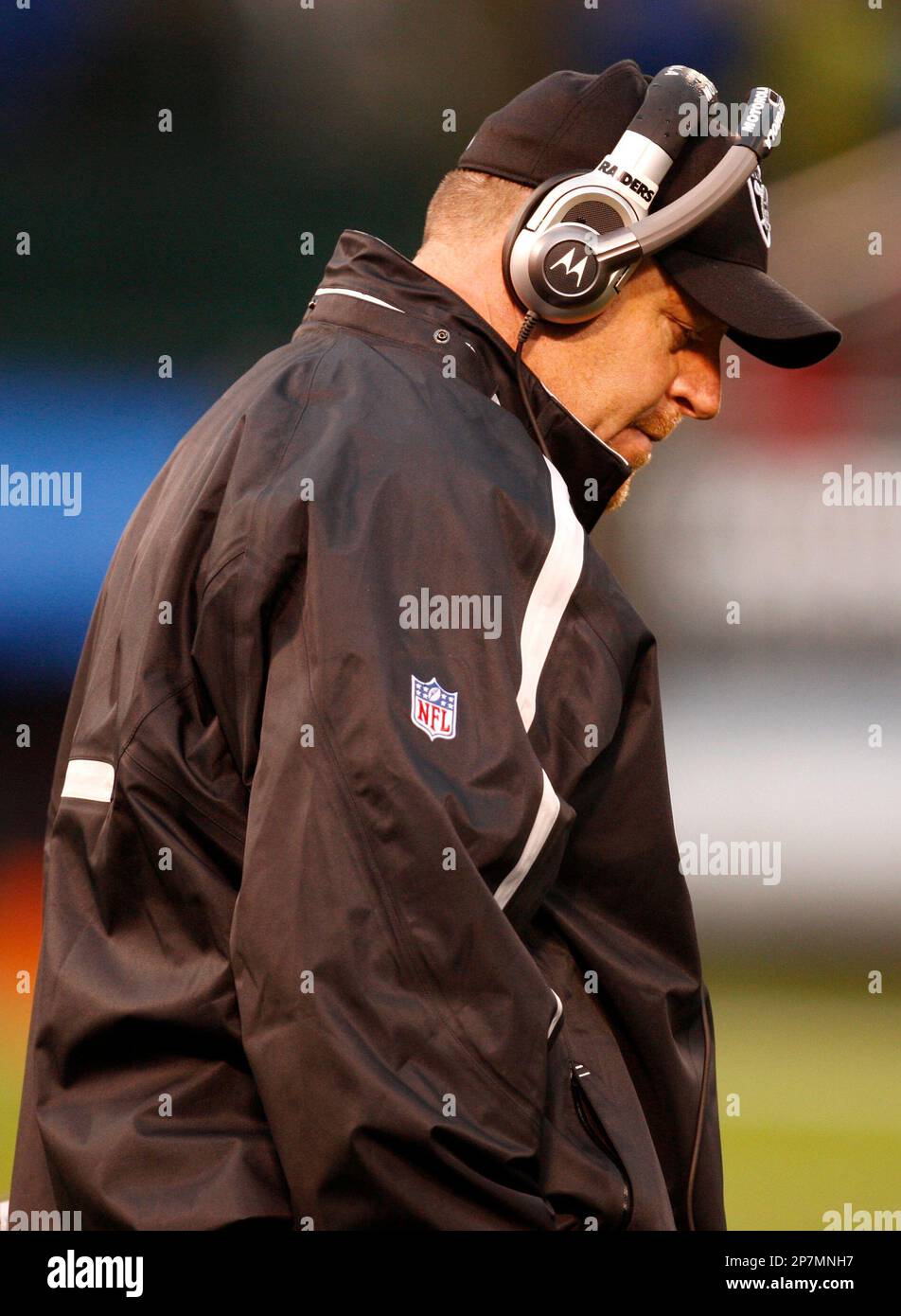 Oakland Raiders head coach Tom Cable stands on the sidelines during the ...