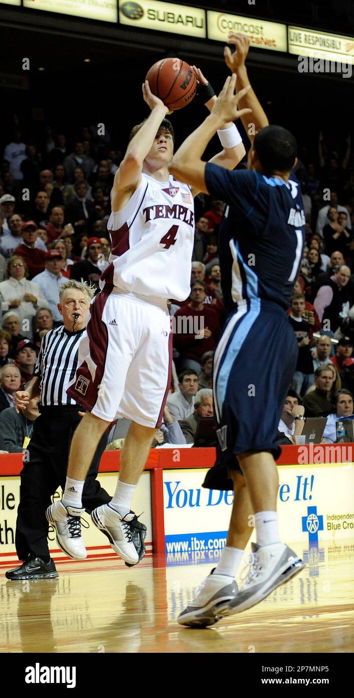Temple guard Juan Fernandez (4) shoots over Villanova guard Scottie ...