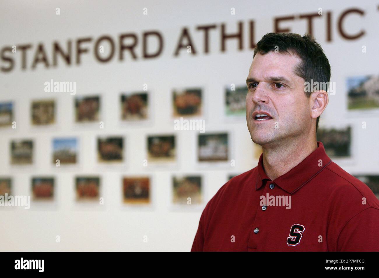 Stanford head football coach Jim Harbaugh, addresses the media during a ...