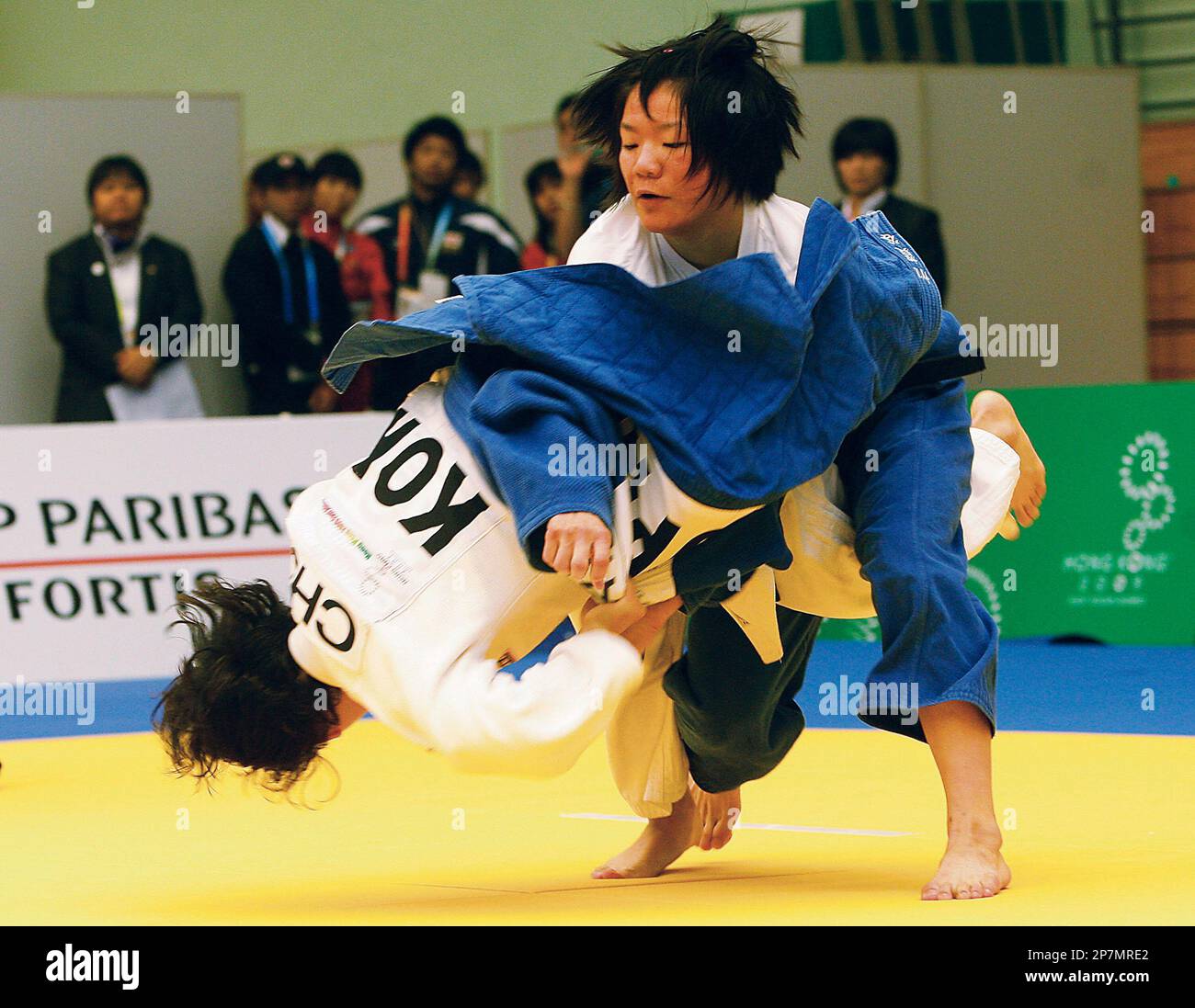 Chiho Kagaya of Japan, blue uniform, and South Korean Choi Keum Mai, in ...