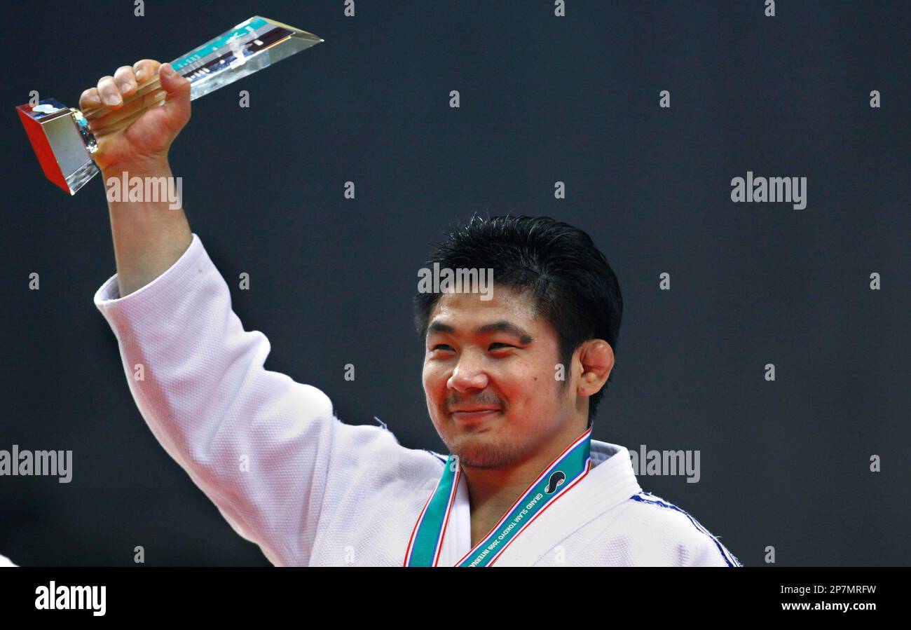 The winner Hwang Hee-tae of South Korea celebrates in the awarding ...