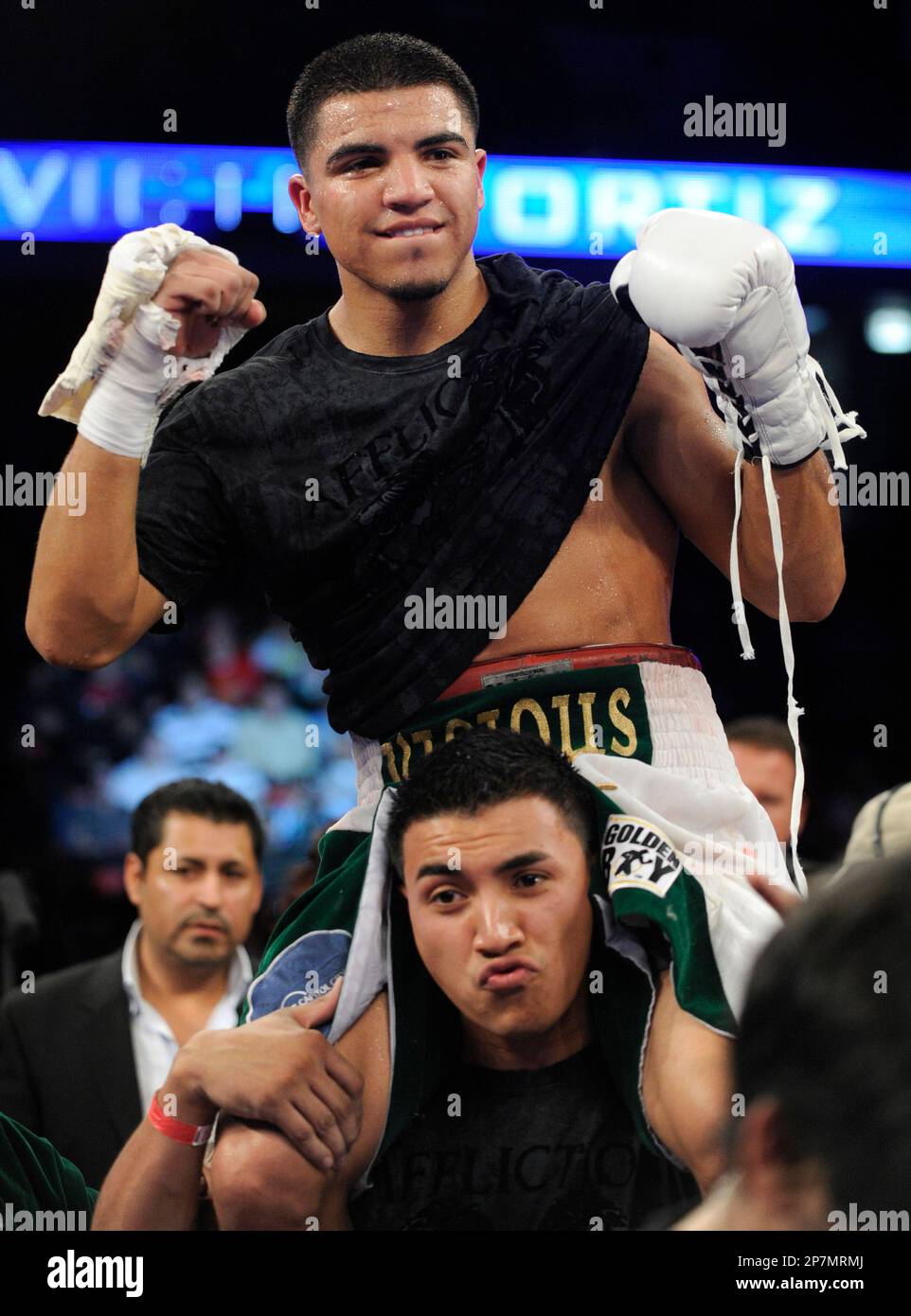 Victor Ortiz celebrates after defeating Antonio Diaz in a NABO ...