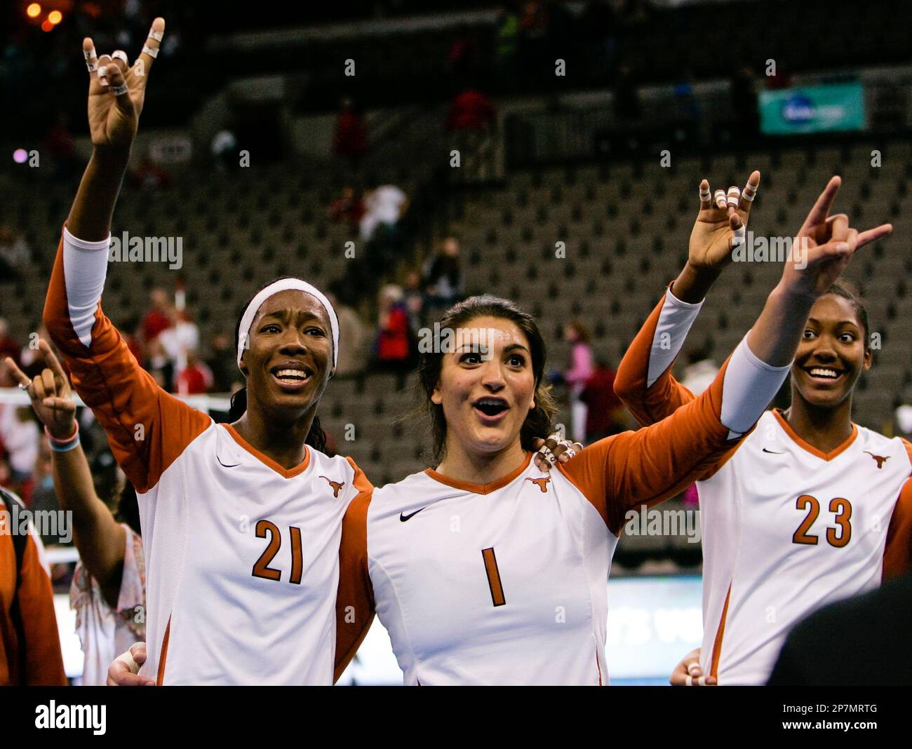 Texas' Destinee Hooker (21), Juliann Faucette (1) and Bailey Webster ...