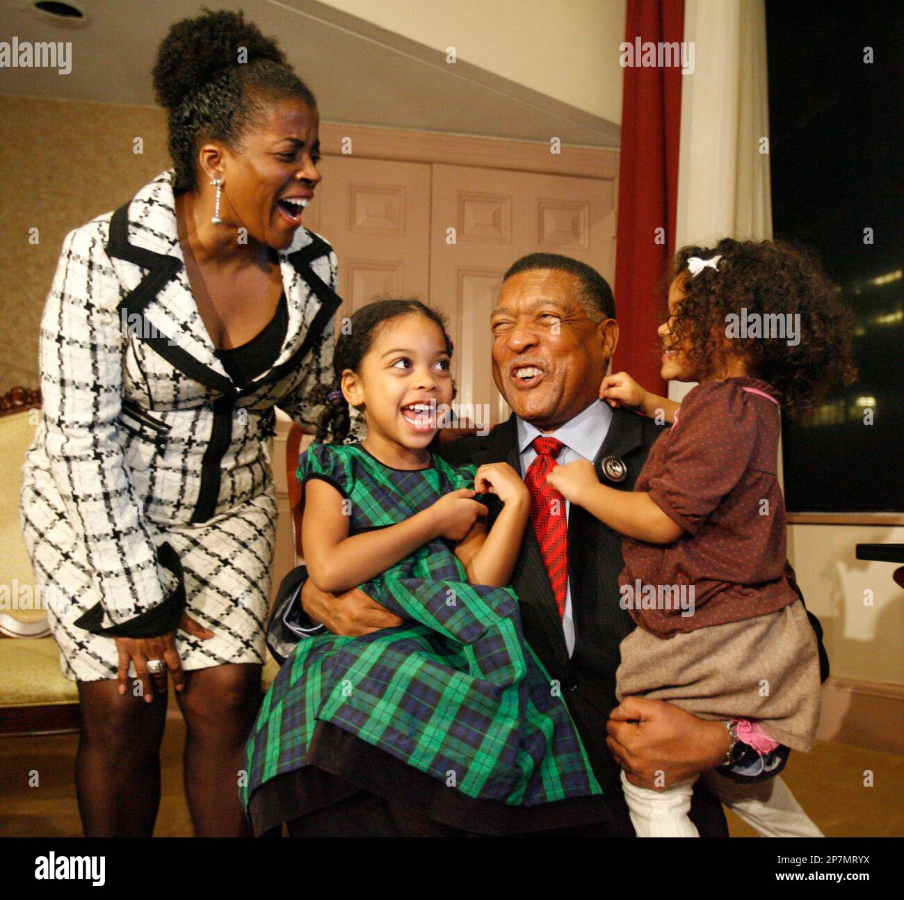 Houston city Mayoral candidate Gene Locke laughs with his wife, Aubrey ...