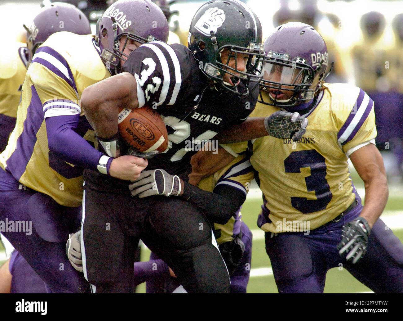 Bearden's Ricky Brown (32) is wrapped up by the Junction City defense ...