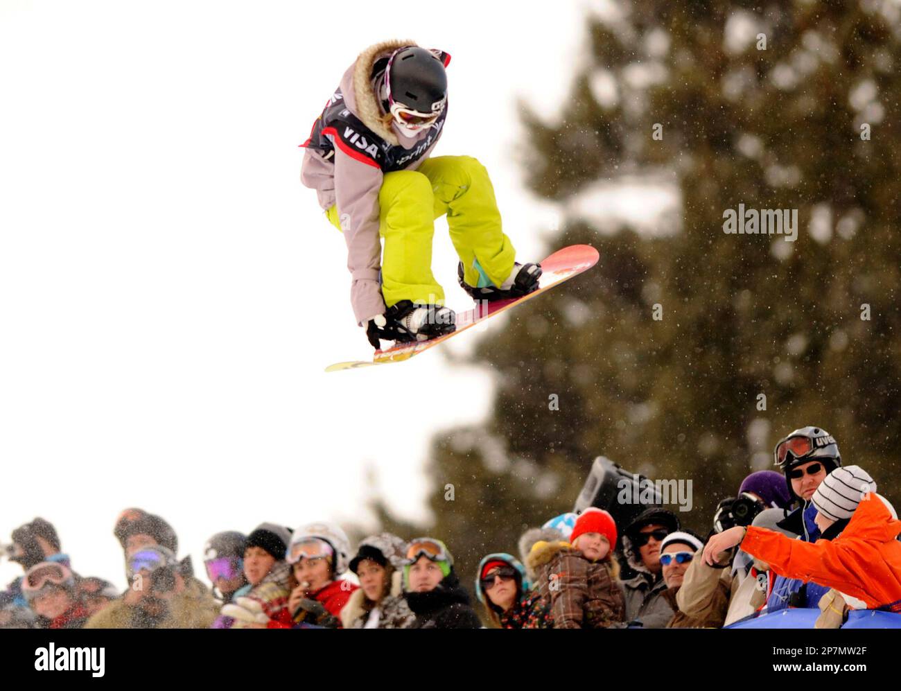 Gretchen Bleiler flies through the air during her second run the womens ...