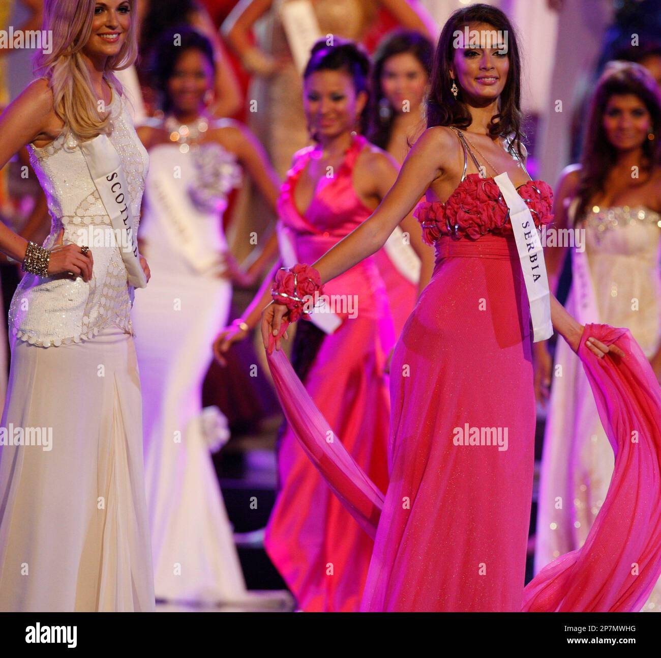 Miss Scotland Katharine Brown, left, stand next to Miss Serbia Jelena ...