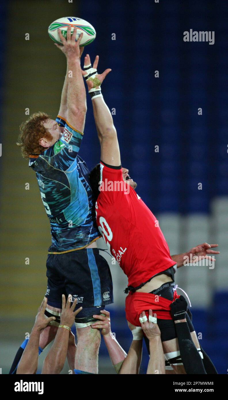 Cardiff Blues' Paul Tito, left, takes the line out from Toulouse's ...